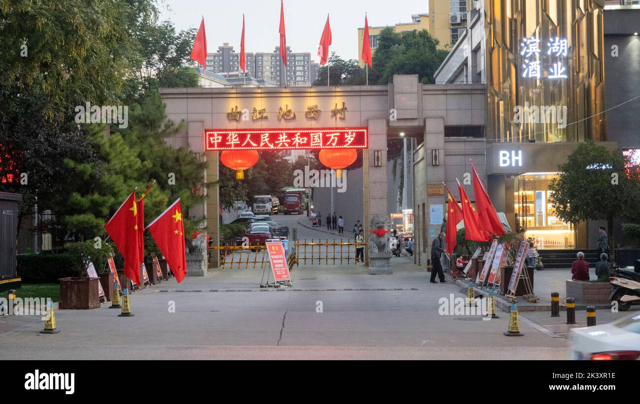 XI'AN, CHINA - SEPTEMBER 28, 2022 - National flags fly on a street in ...