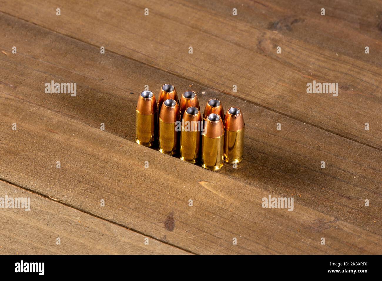 9 milimeter ammunition laying on the table Stock Photo - Alamy