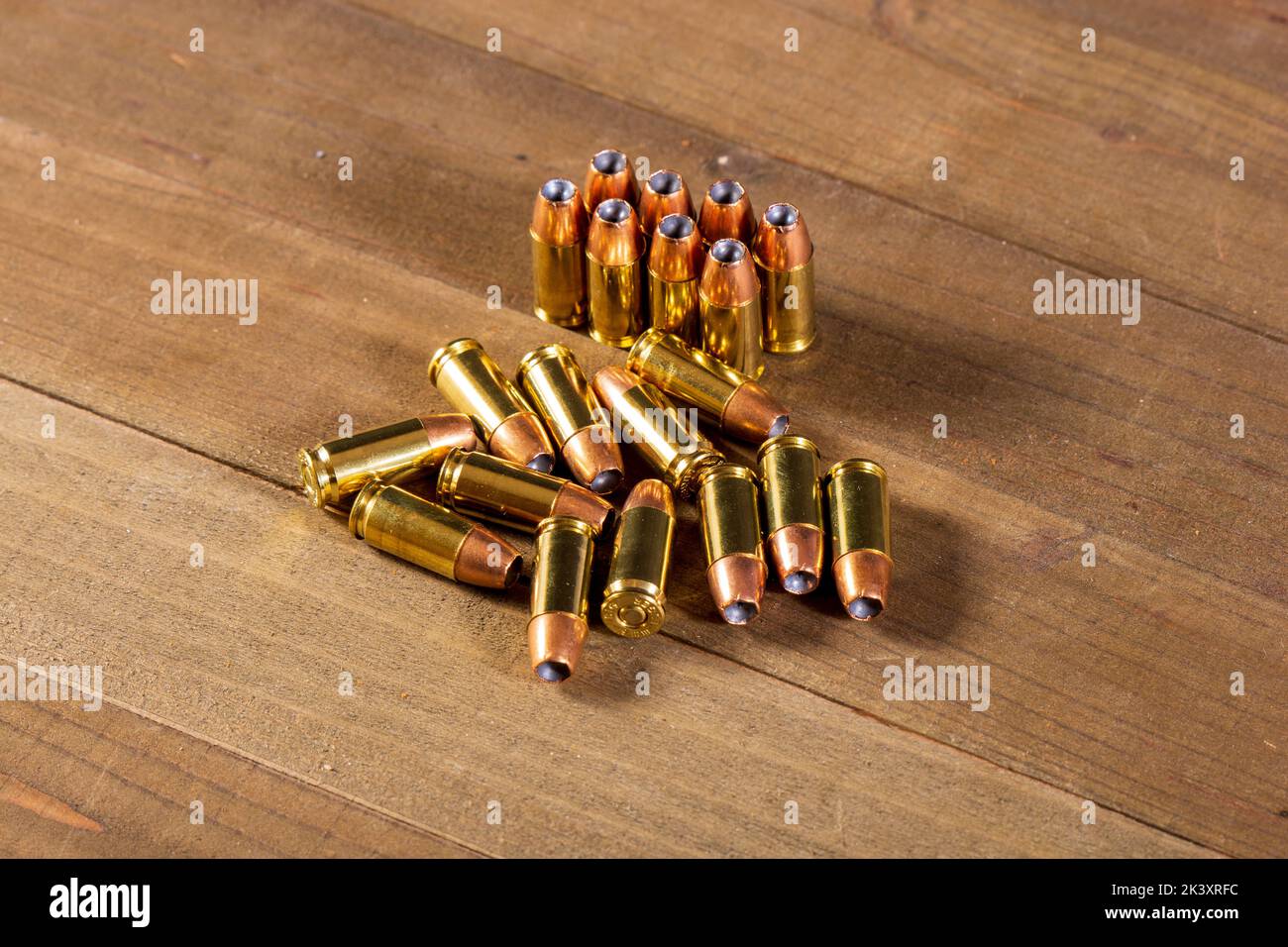 9 milimeter ammunition laying on the table Stock Photo - Alamy