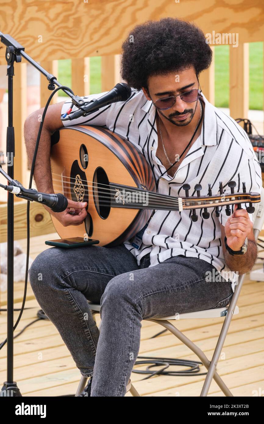Mohamed Hosny, Oud Player, Tuning his Oud at a Folklife Festival Stock ...