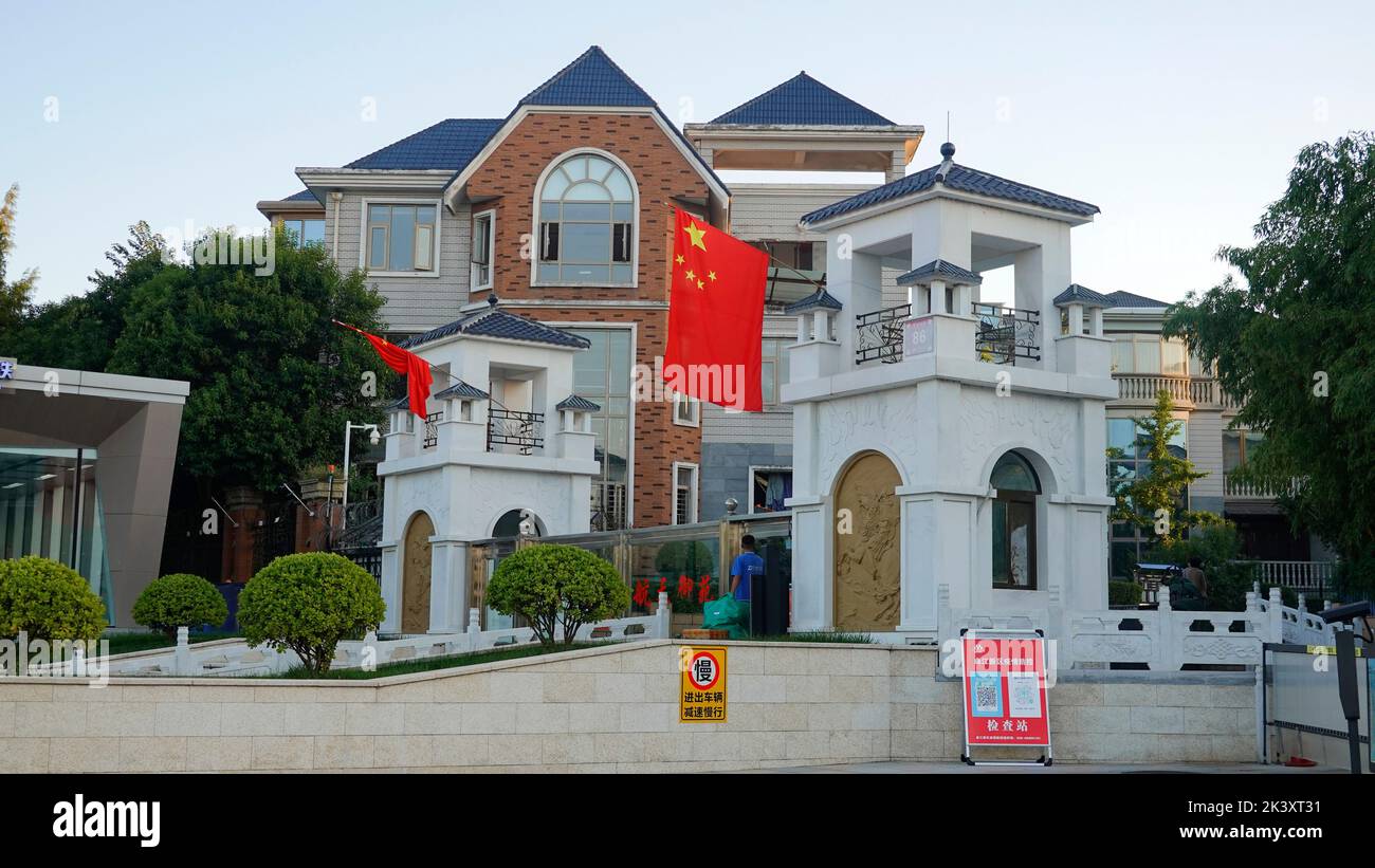 XI'AN, CHINA - SEPTEMBER 28, 2022 - National flags fly on a street in ...