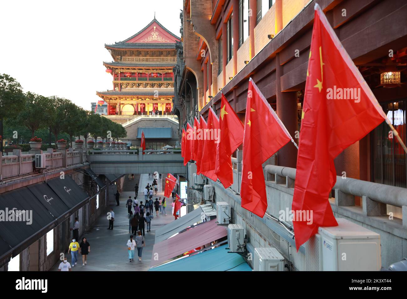 XI'AN, CHINA - SEPTEMBER 28, 2022 - National flags fly on a street in ...