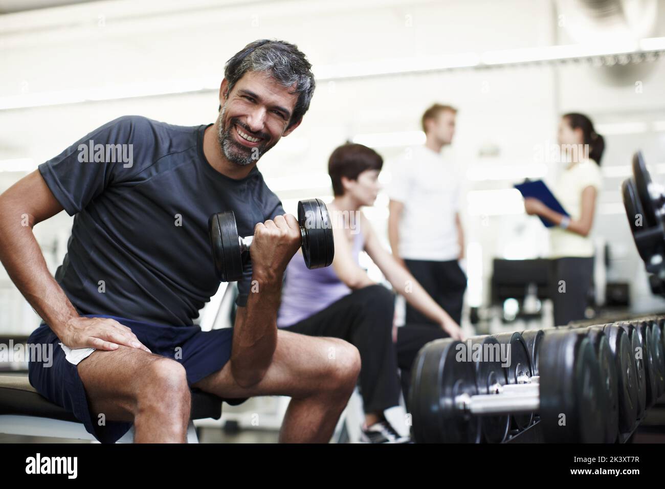 I love working out. Cropped portrait of a handsome young man working ...