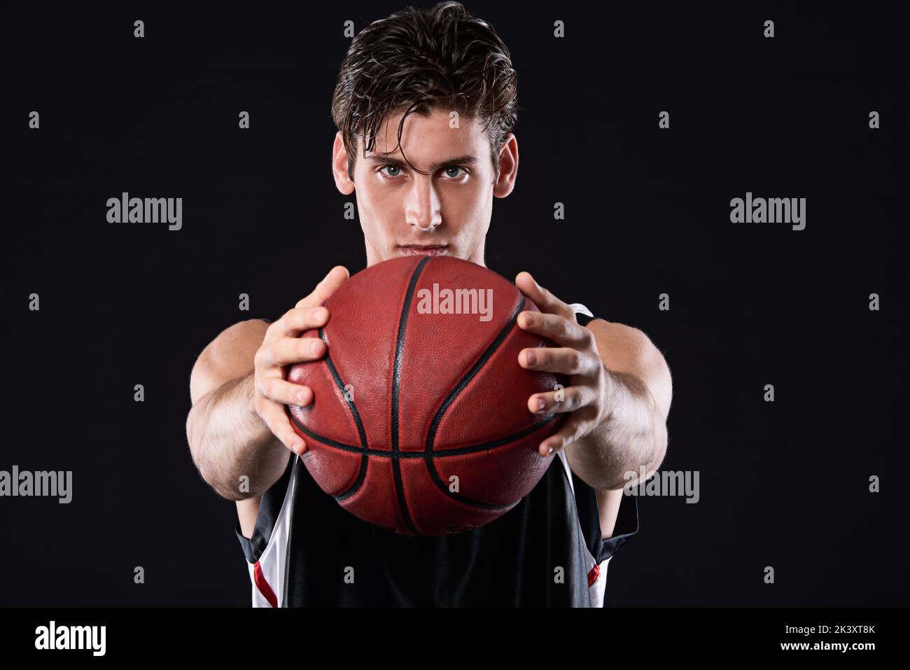 I challenge you. Cropped studio portrait of a determined basketball ...