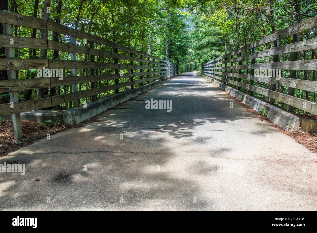 Silver Comet Trail 65 mile paved path Georgia USA low view wooden rail ...