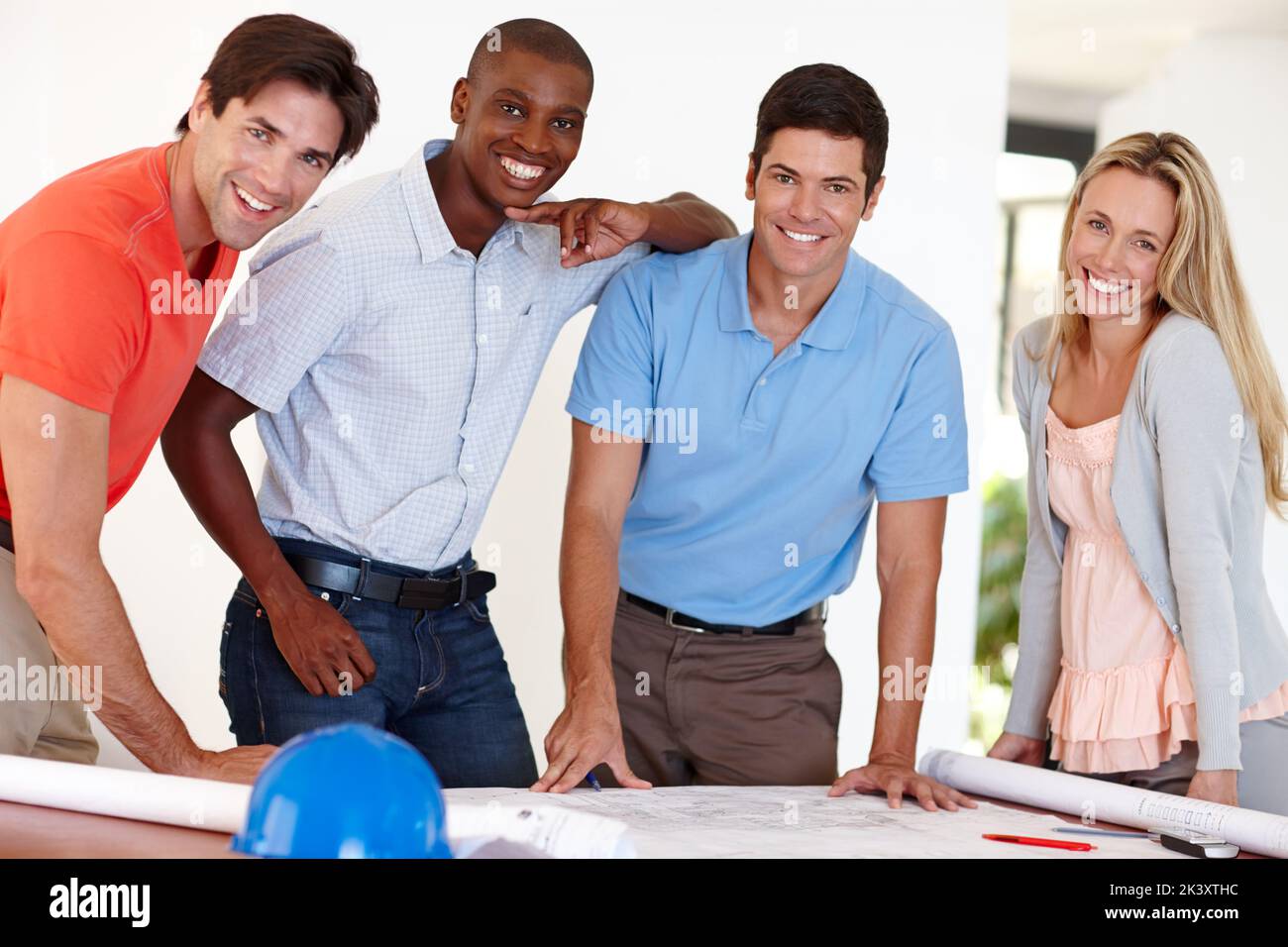 The dream team of architects. Portrait of a team of architects standing ...