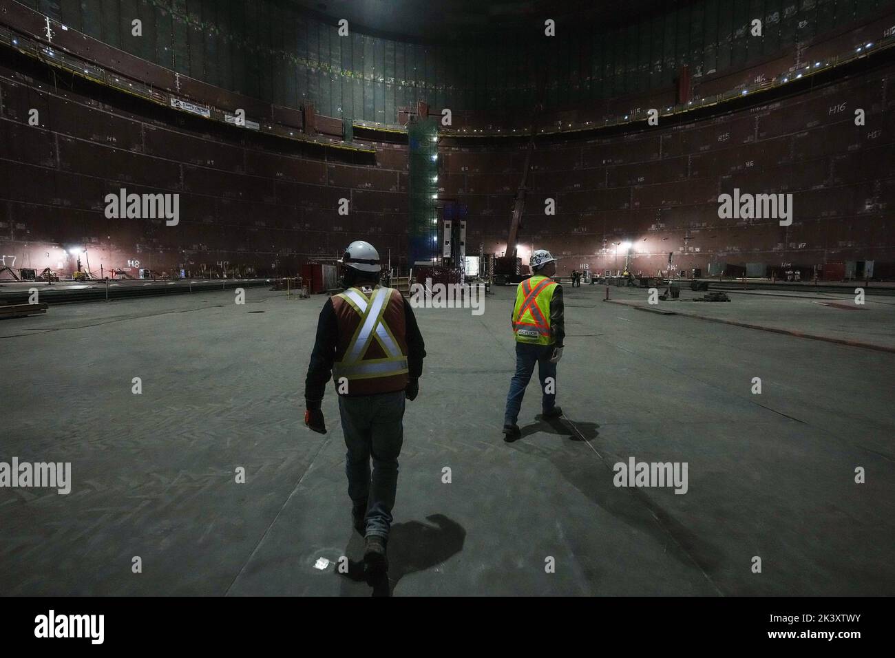 The inside of a massive liquefied natural gas storage tank is seen ...