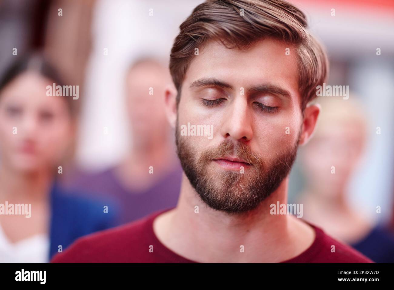 Inner creative vision. an office worker standing with his eyes closed ...