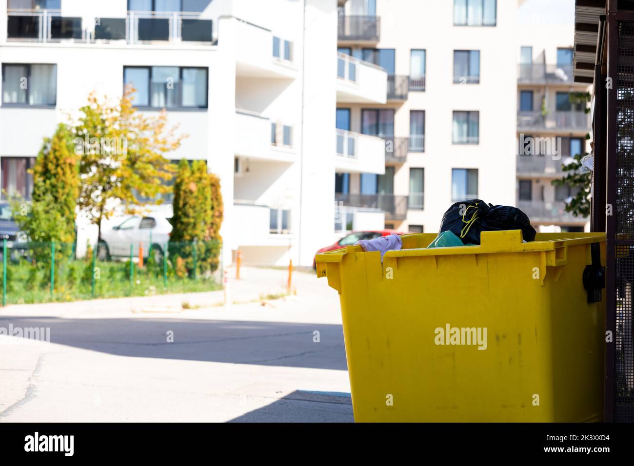 Close up picture of trash bin full of garbage on the street Stock Photo ...