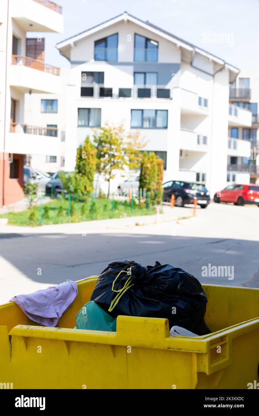 Close up picture of trash bin full of garbage on the street Stock Photo ...