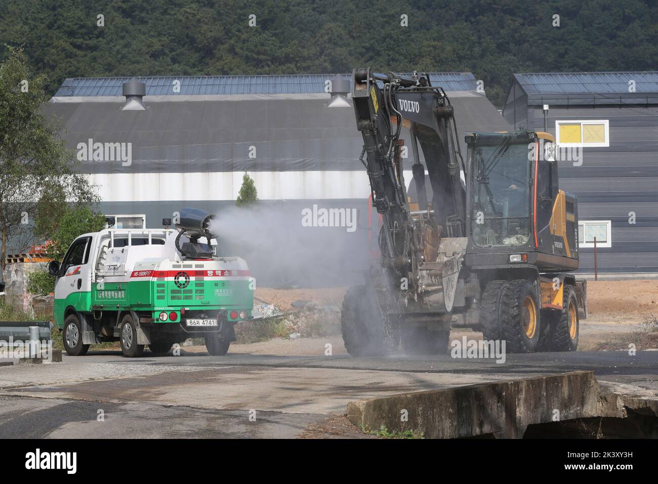 29th Sep, 2022. ASF outbreak A quarantine vehicle sprays disinfectant at a pig farm in Paju, 30 ...