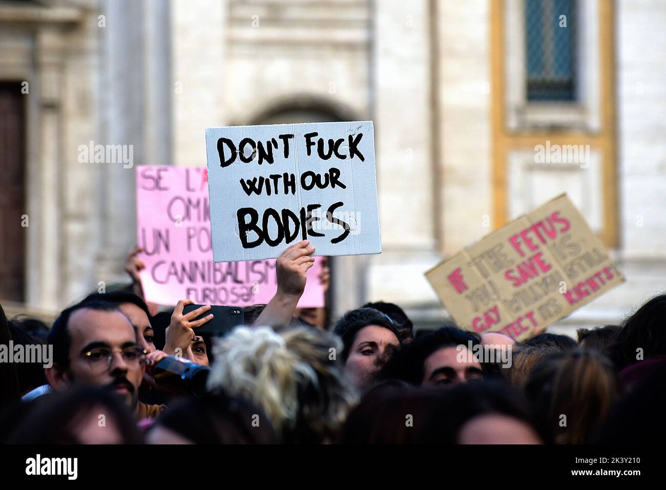Rome, Italy. 28th Sep, 2022. Protesters display placards expressing ...