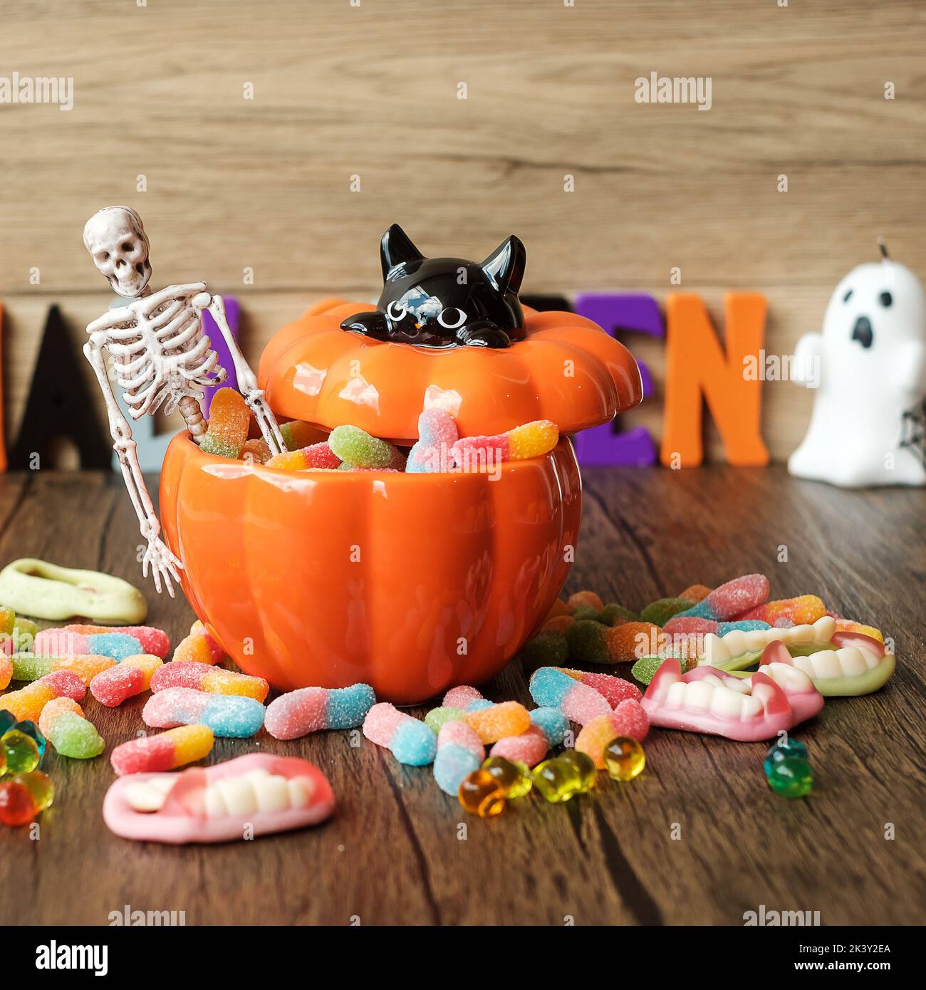 Happy Halloween day with ghost candies, candle, pumpkin, Jack O lantern ...
