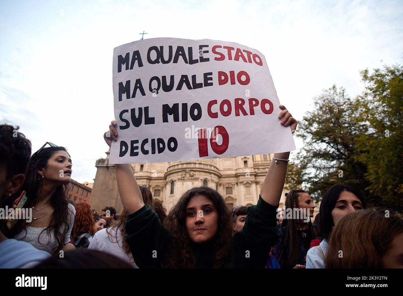Rome, Italy. 28th Sep, 2022. A protester displays a sign expressing her ...