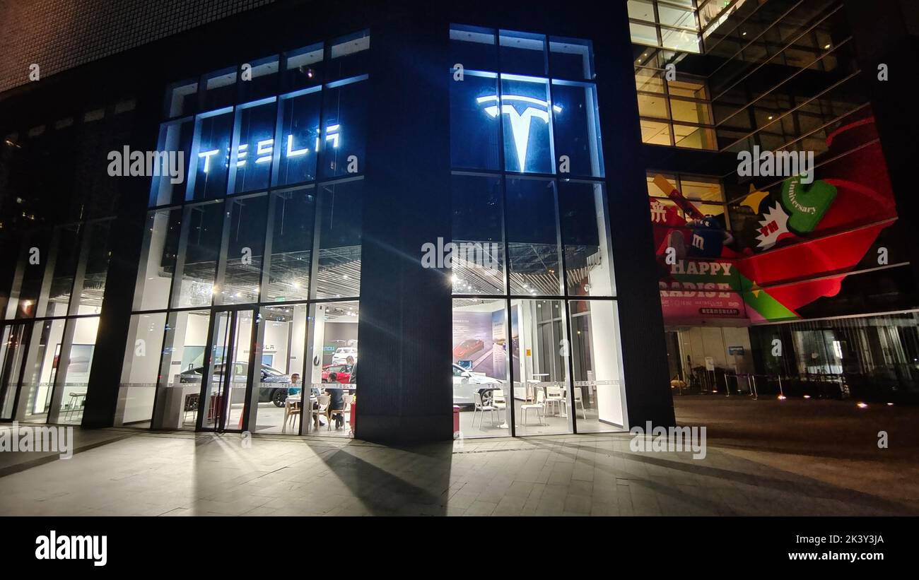 SHANGHAI, CHINA - SEPTEMBER 28, 2022 - A night view of a Tesla store ...