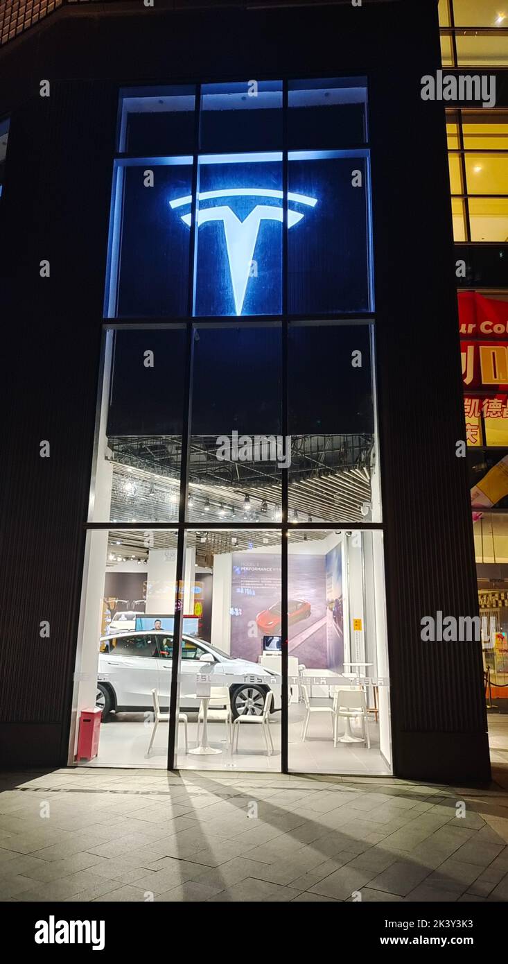 SHANGHAI, CHINA - SEPTEMBER 28, 2022 - A night view of a Tesla store ...
