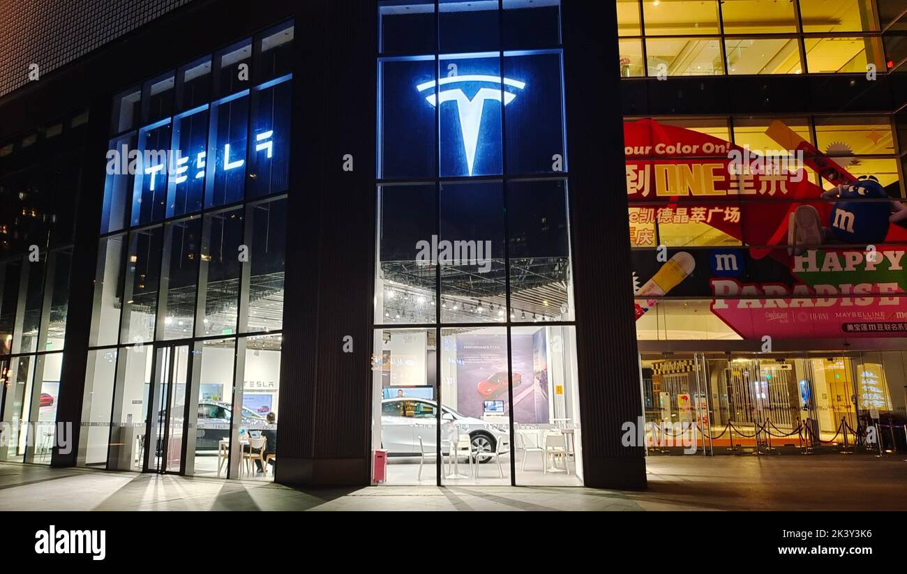 SHANGHAI, CHINA - SEPTEMBER 28, 2022 - A night view of a Tesla store ...