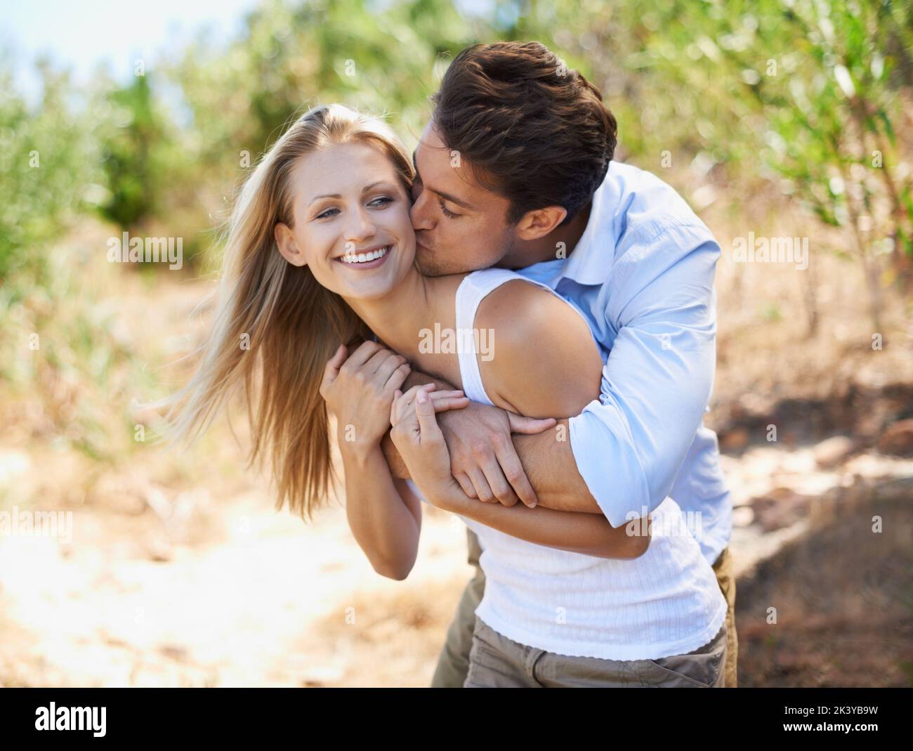 Young man smiling playfully outdoors hi-res stock photography and ...