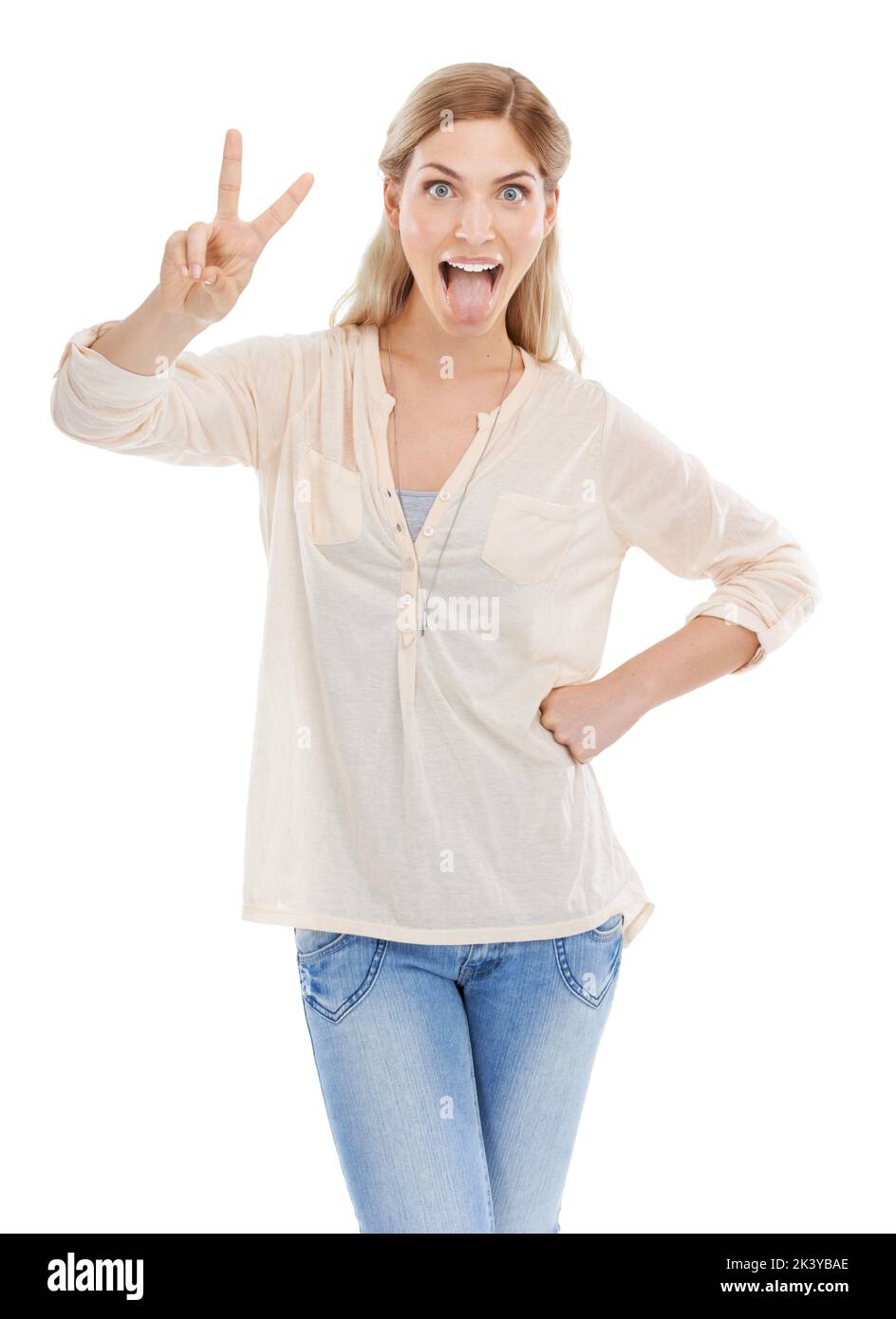 Stay funky. Studio shot of an attractive young woman showing you the ...