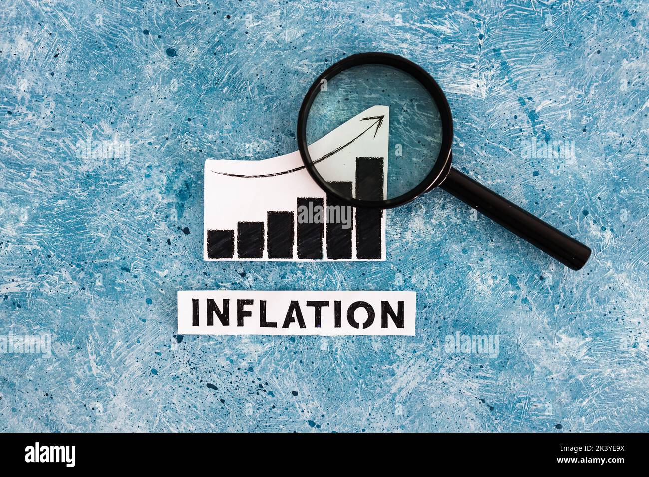 inflation text and graph showing prices going up with magnifying glass ...