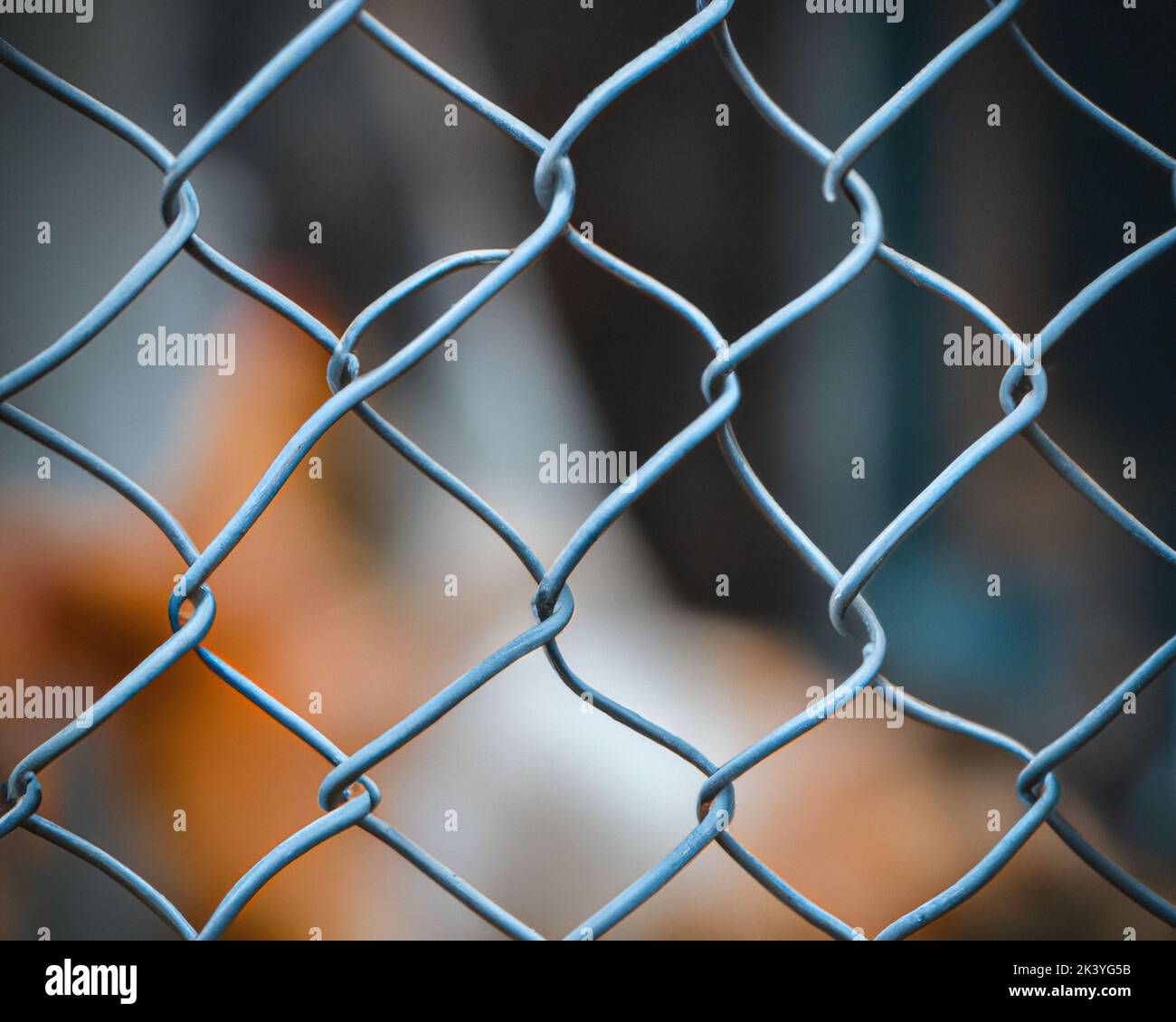 A closeup of a grid fence for background Stock Photo - Alamy