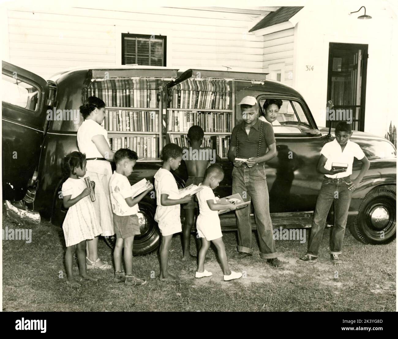 African-American children secure books at a North Carolina Albemarle ...
