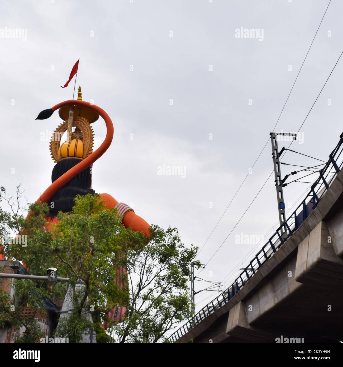 Big statue of Lord Hanuman near the delhi metro bridge situated near ...
