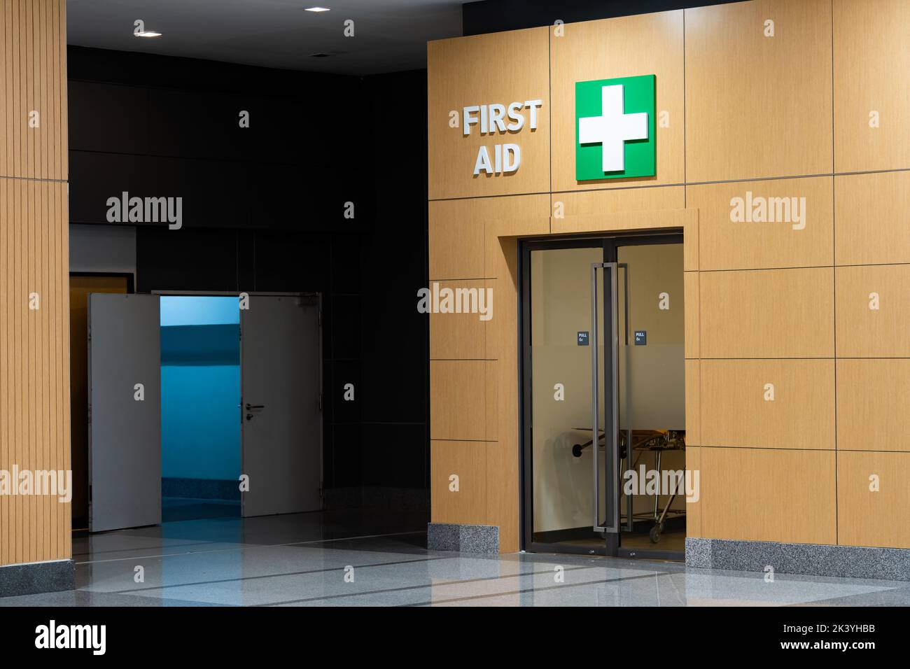 First Aid room inside a building. Decorated with pain light brown wall ...