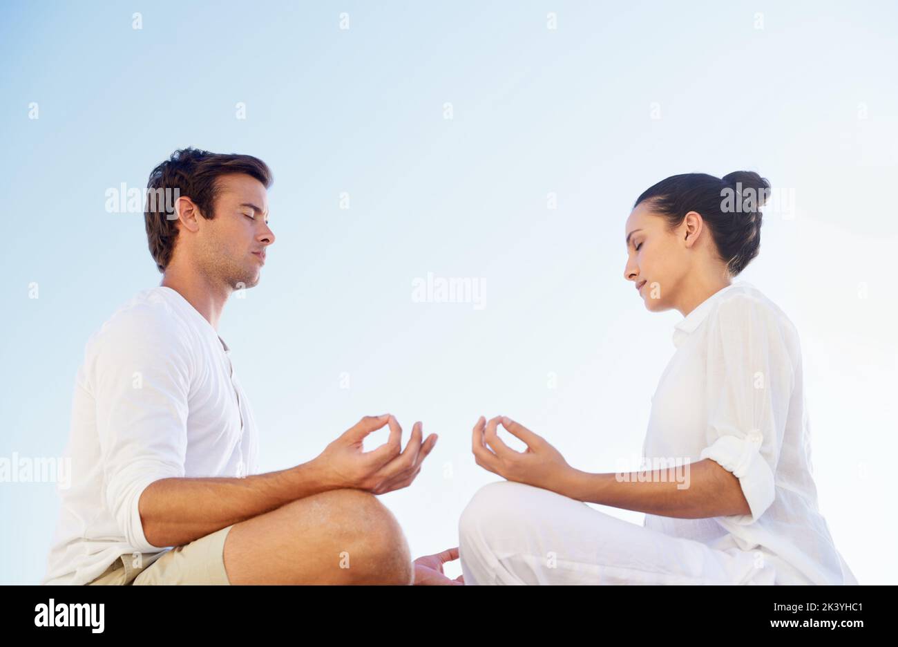 Finding peace and tranquility with each other. A young couple ...