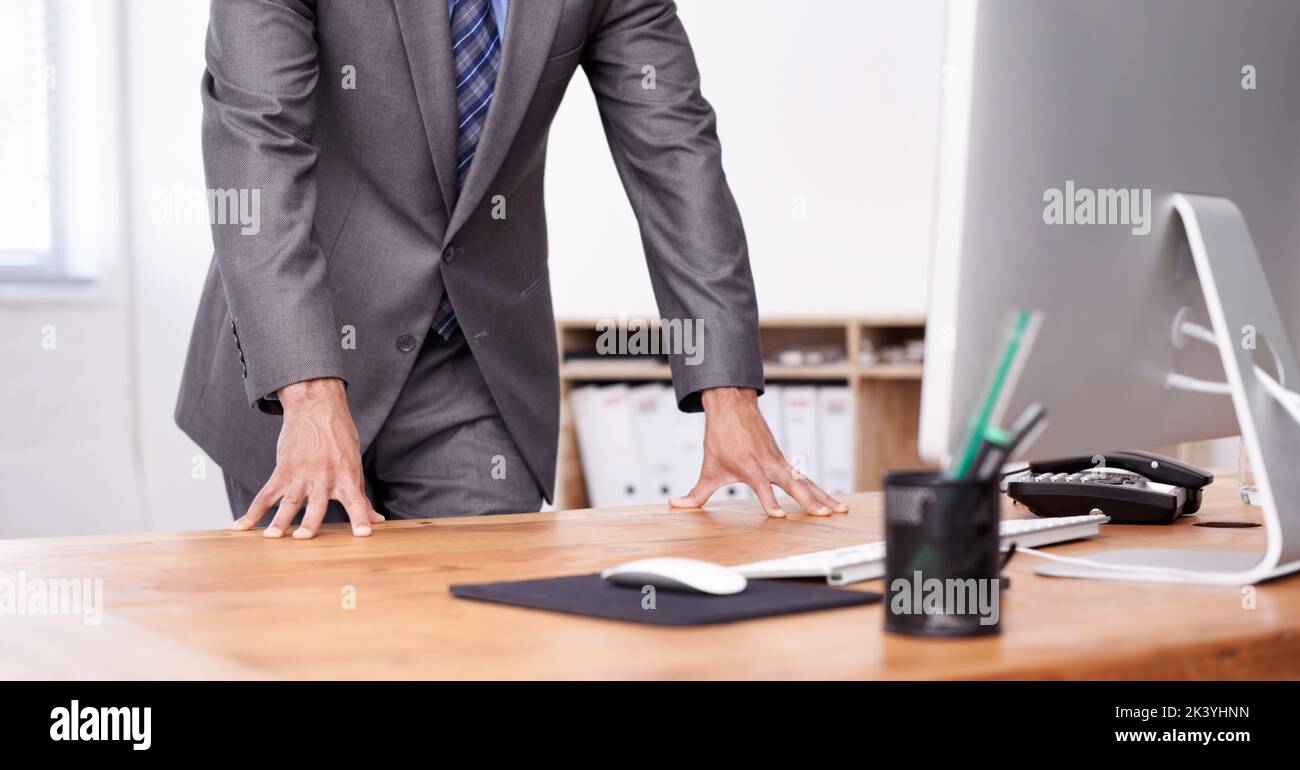 The business position. Cropped shot a businessman standing with his ...