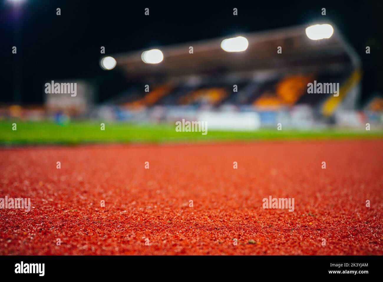 Track and field background. Red athletics track. Blurred background ...