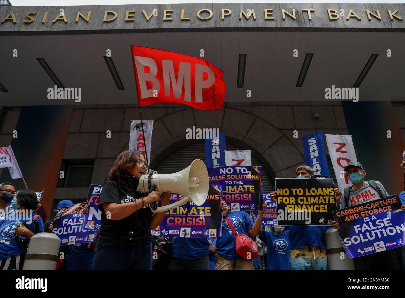 Manila, Philippines. 29th Sep, 2022. Climate activists hold placards ...
