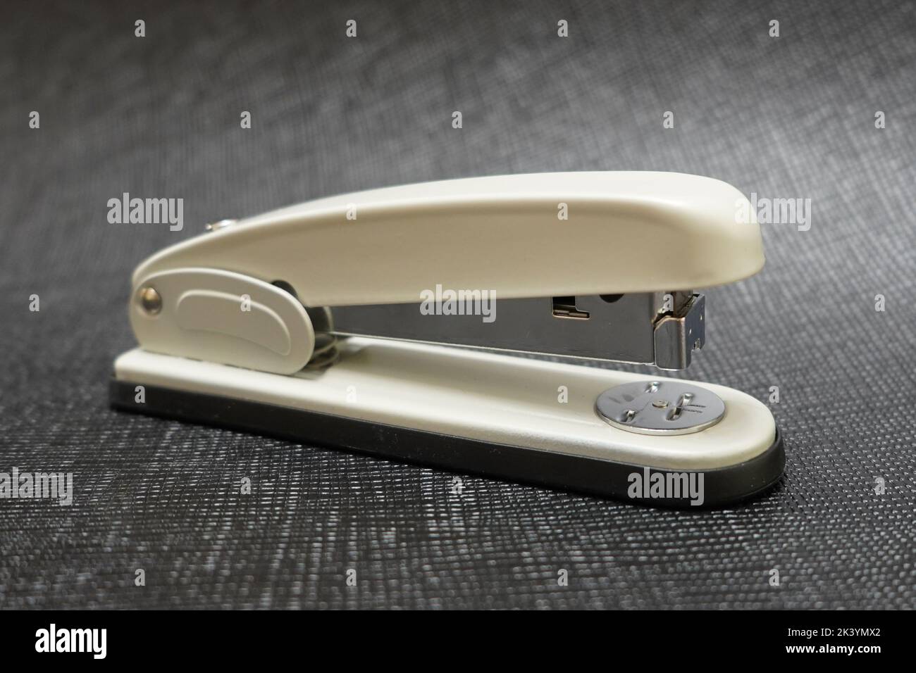 office gray stapler completely in traditional black background Stock ...