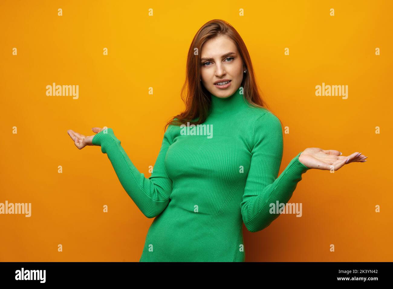 Portrait of cute attractive young woman showing whatever gesture on ...