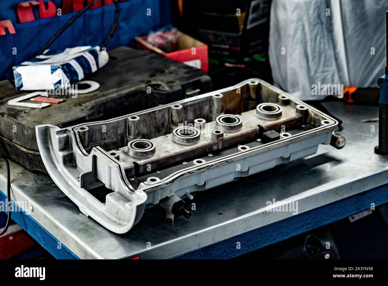 Disassembled car engine block at car service station Stock Photo - Alamy
