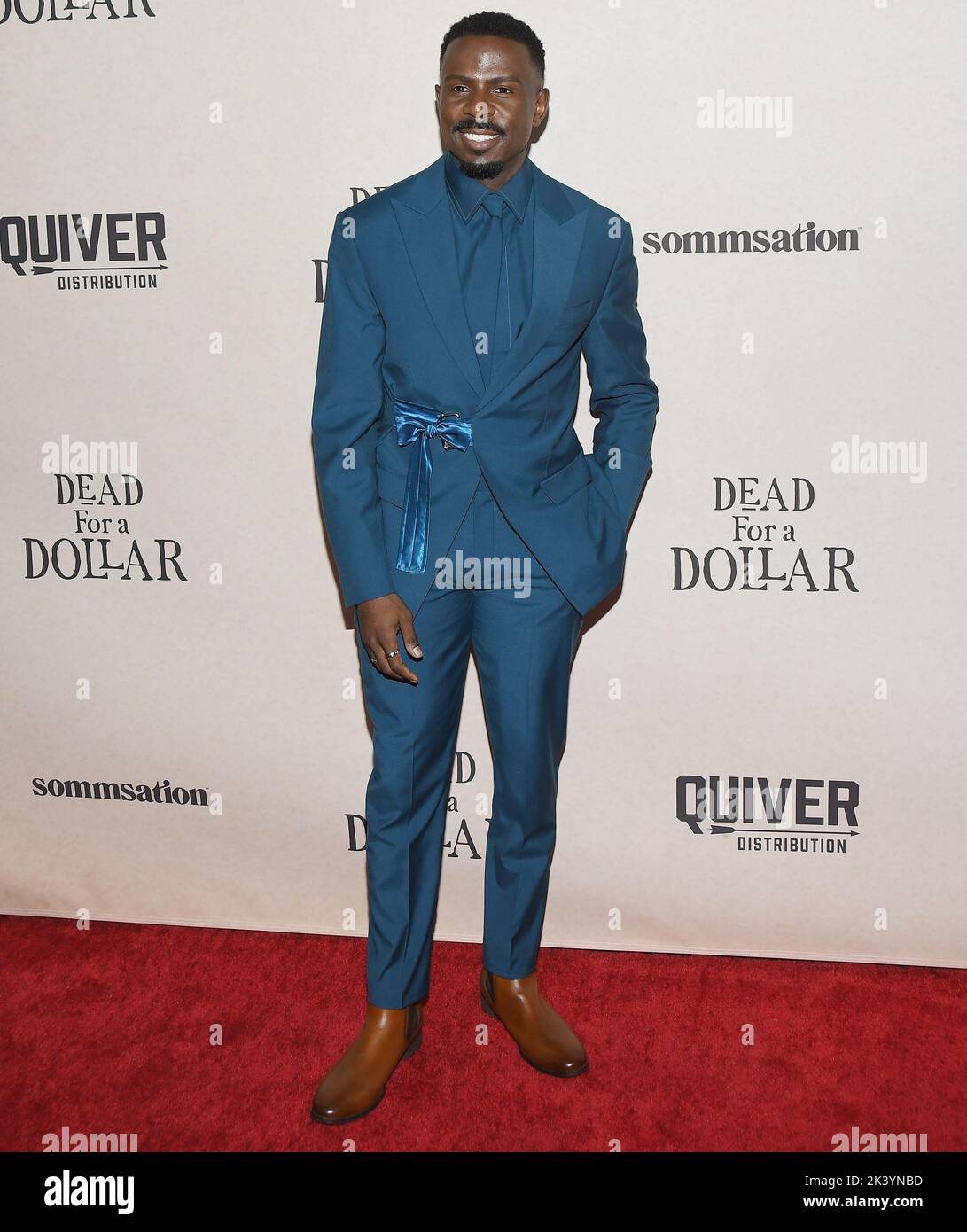 Warren S.L. Burke arrives at the DEAD FOR A DOLLAR Premiere held at the ...