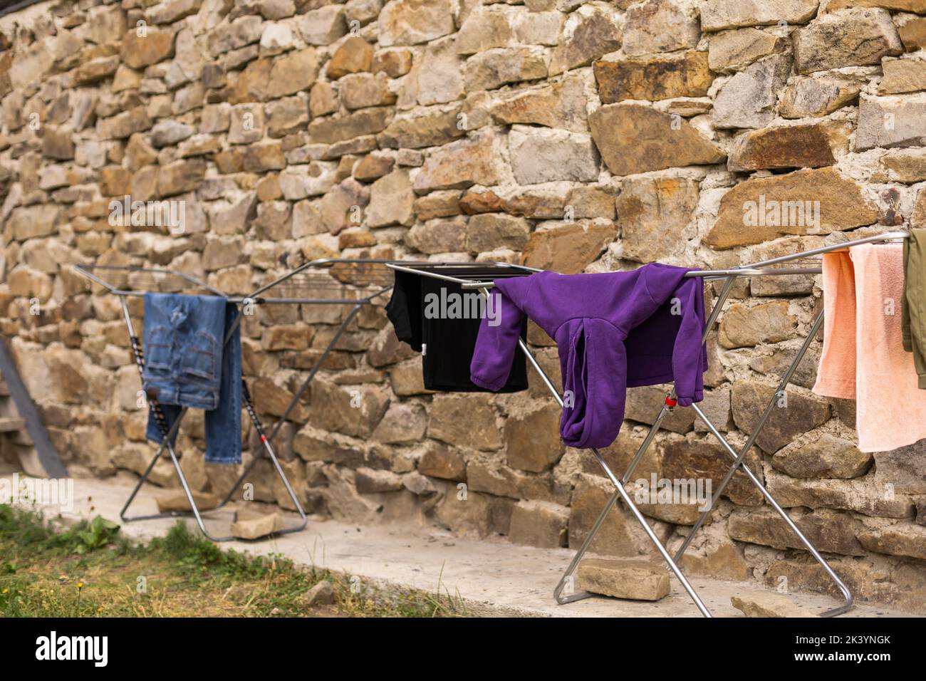 laundry drying outside in the town Stock Photo - Alamy