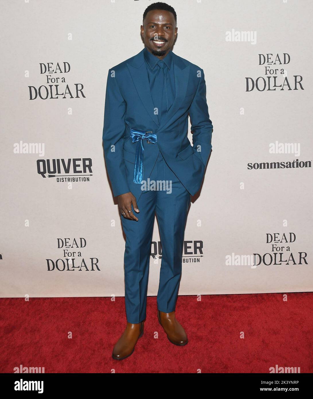 Warren S.L. Burke arrives at the DEAD FOR A DOLLAR Premiere held at the ...