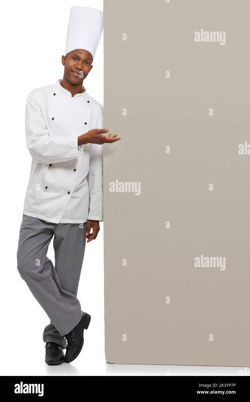 Handsome chef showing menu hi-res stock photography and images - Alamy