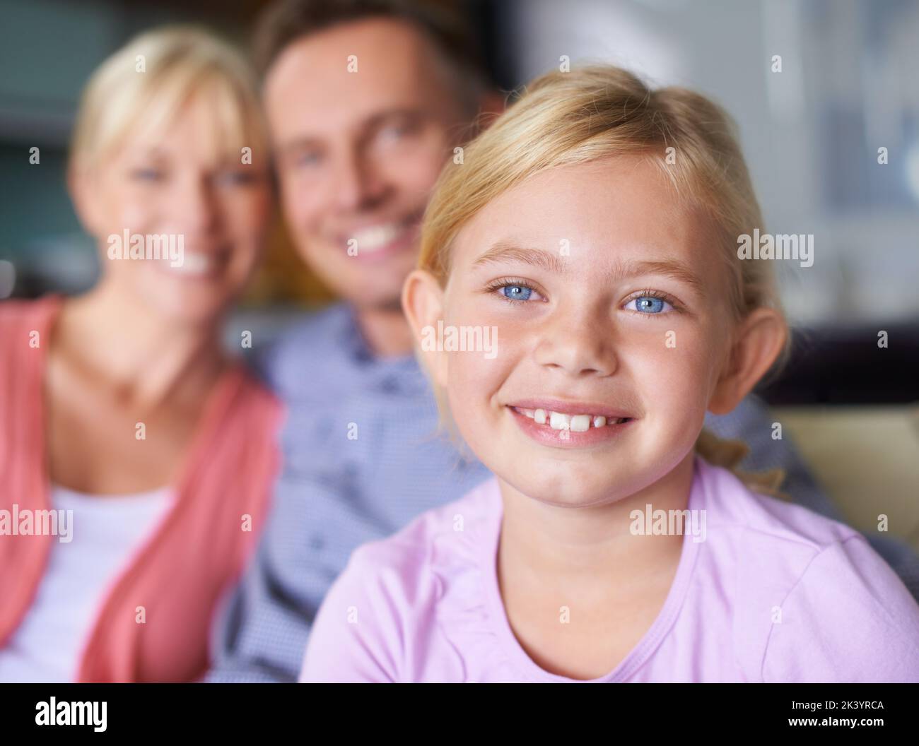 Shes so precious to her parents. A cute young girl smiling as her ...