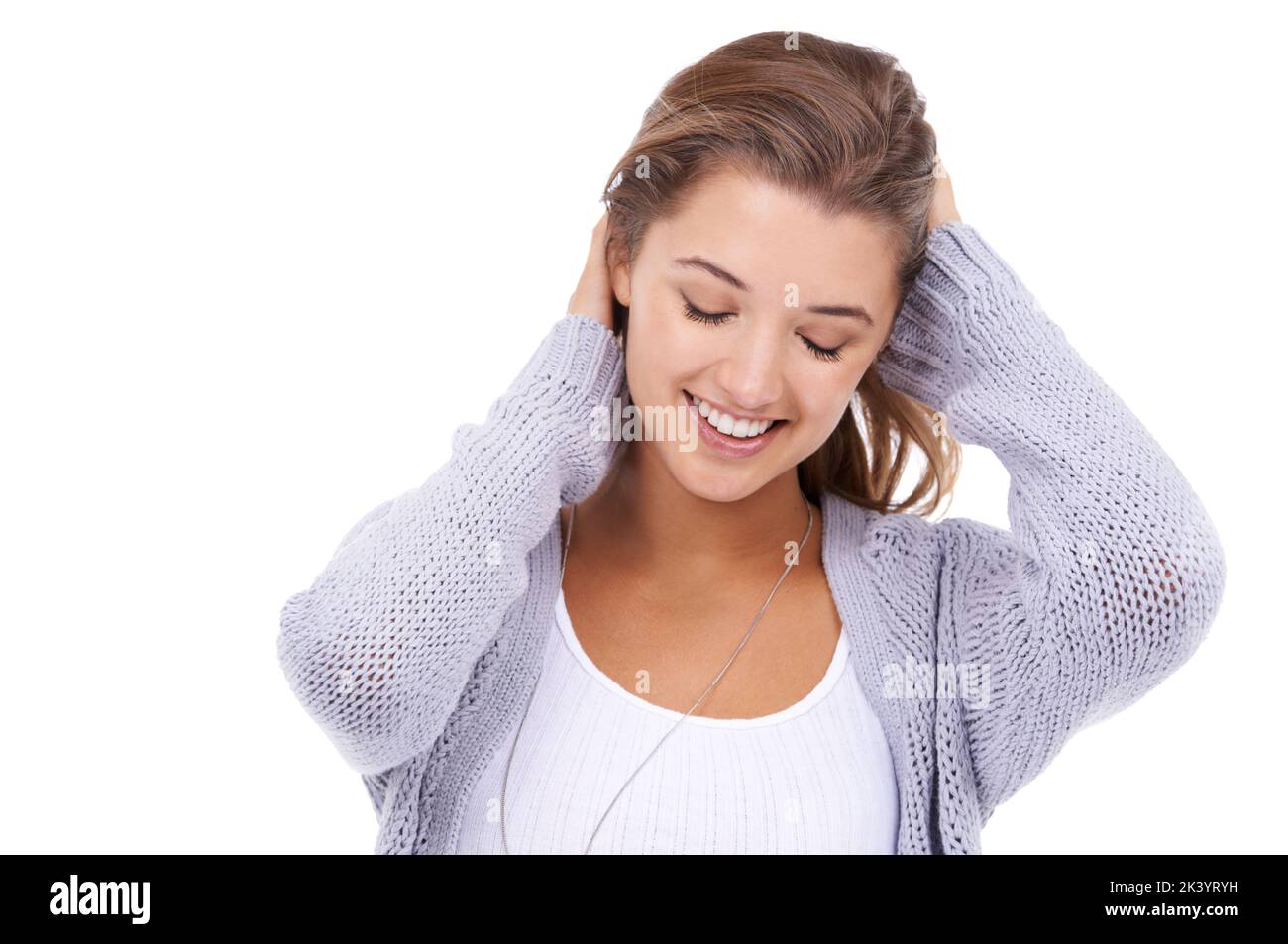 My hair is so silky and smooth. A gorgeous young woman playing with her ...