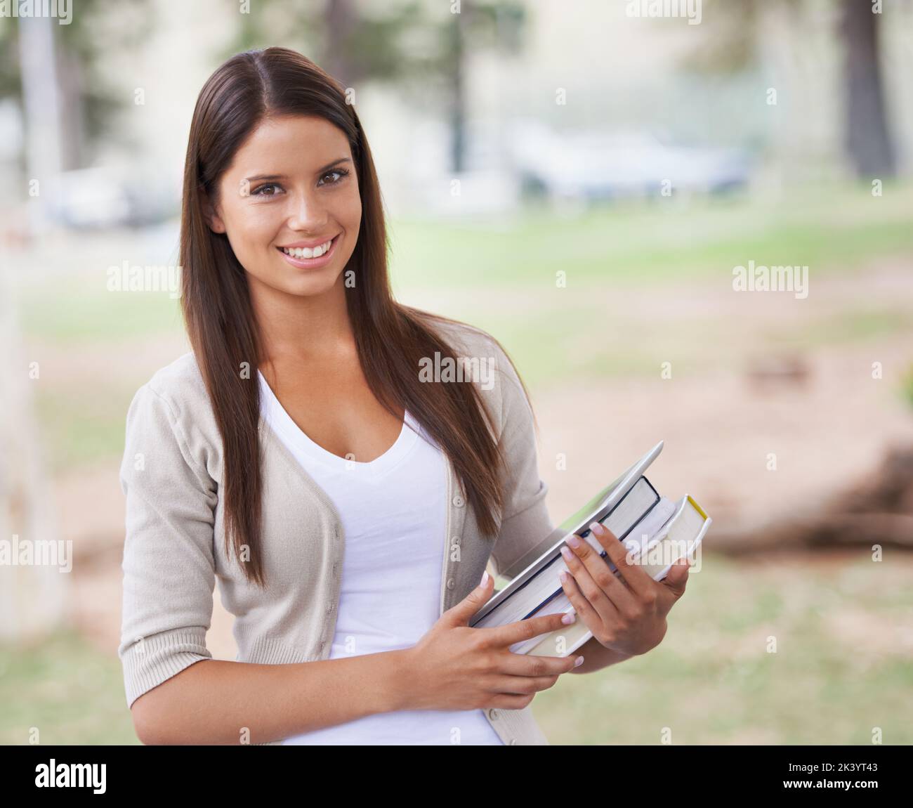 Ive done all my homework. A beautiful young student standing outside ...