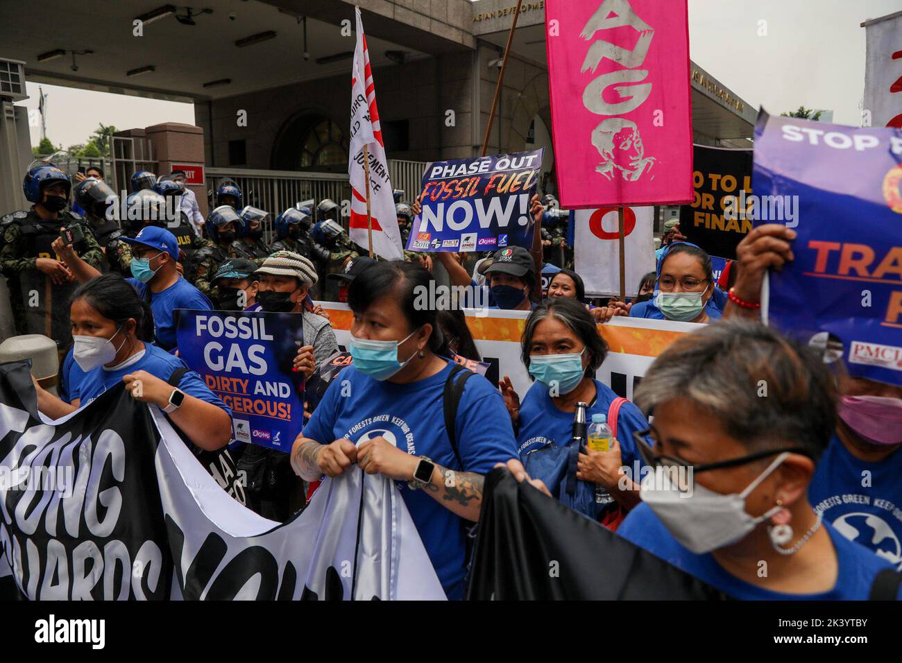 Manila, Philippines. 29th Sep, 2022. Climate activists hold placards ...