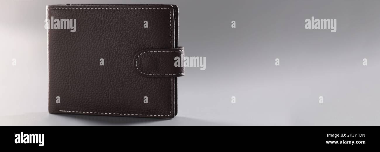 Brown genuine leather wallet with banknotes and credit card inside ...