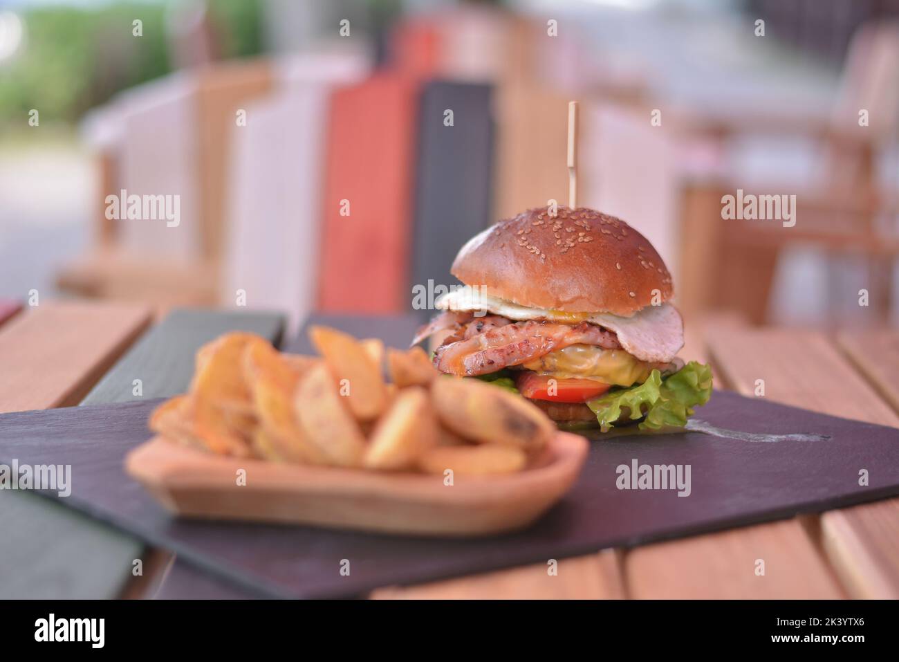 Burger menu on the fast food table Stock Photo - Alamy