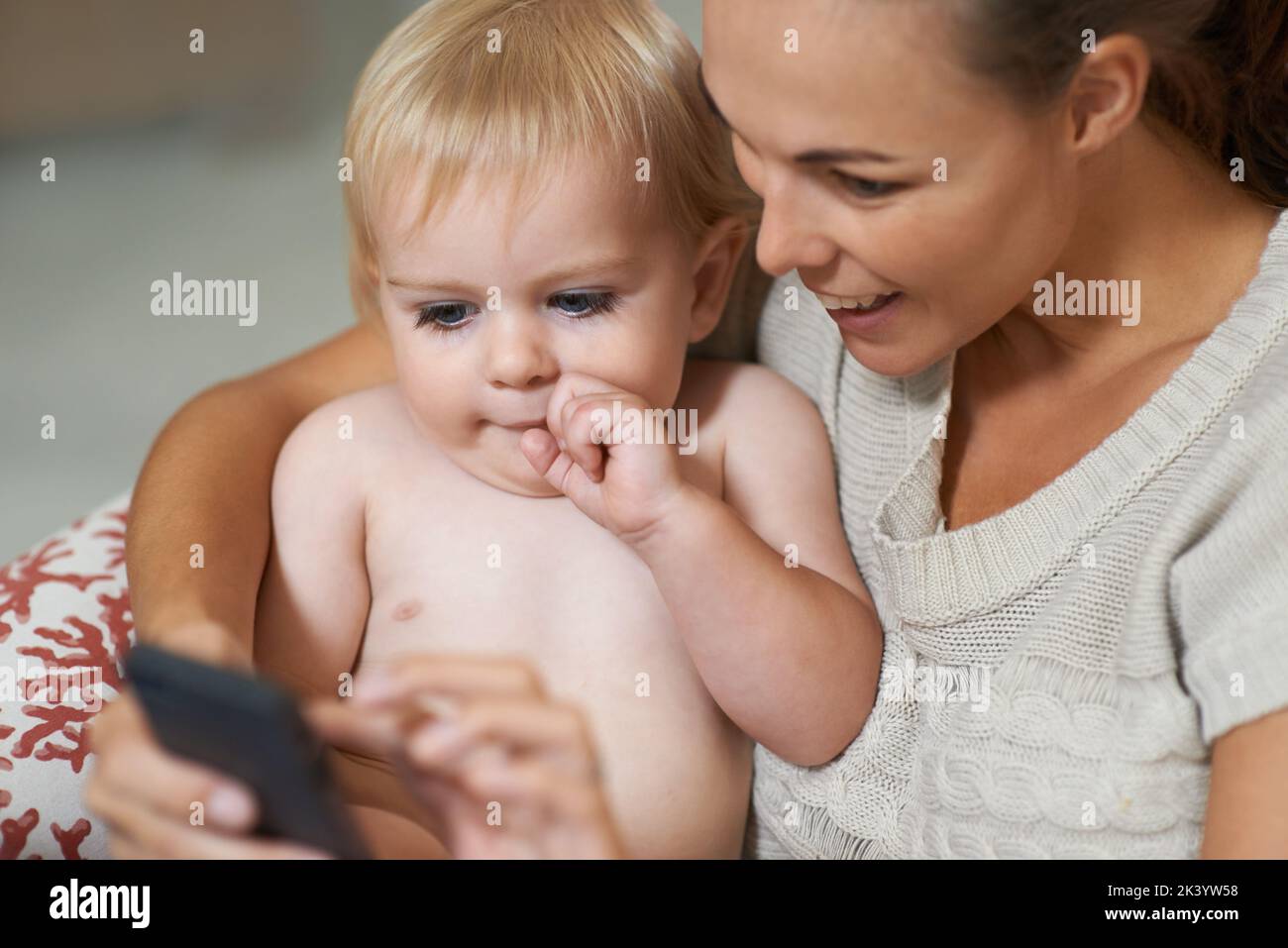 Girl showing something to a boy hi-res stock photography and images - Alamy