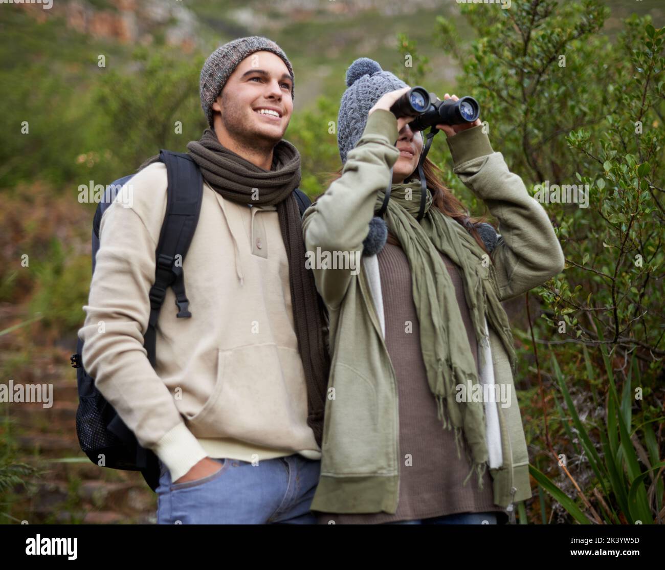Taking in all the sights. A young couple taking in all the scenary ...