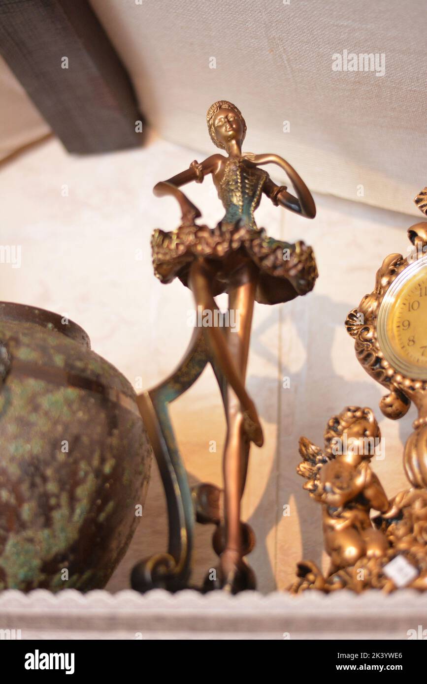Bronze statue with a ballerina in a boutique Stock Photo - Alamy