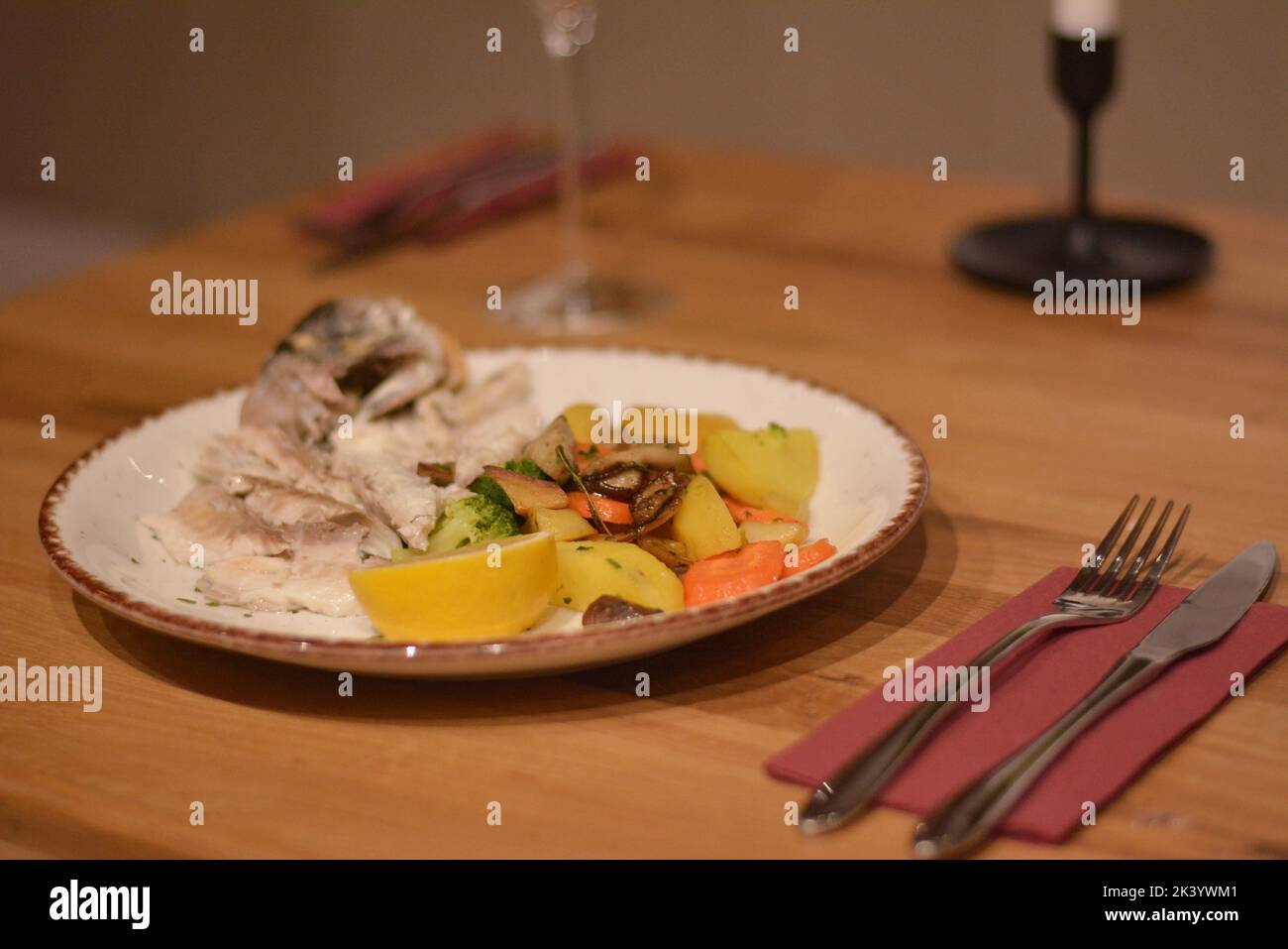 Boneless fish with sauteed vegetables Stock Photo - Alamy