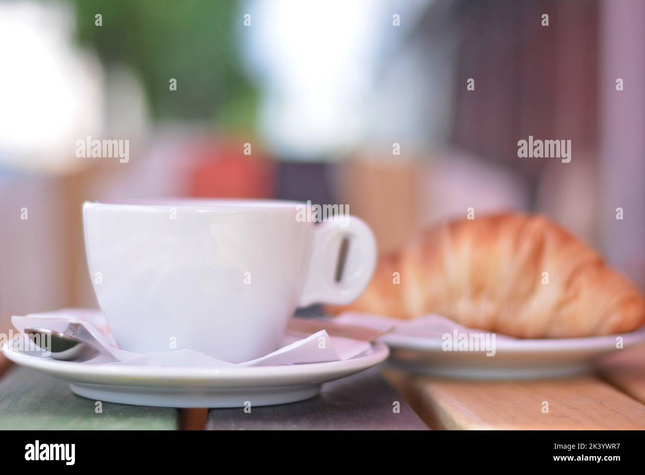 Breakfast. Colazione italian breakfast. A cup of coffee and a croissant ...